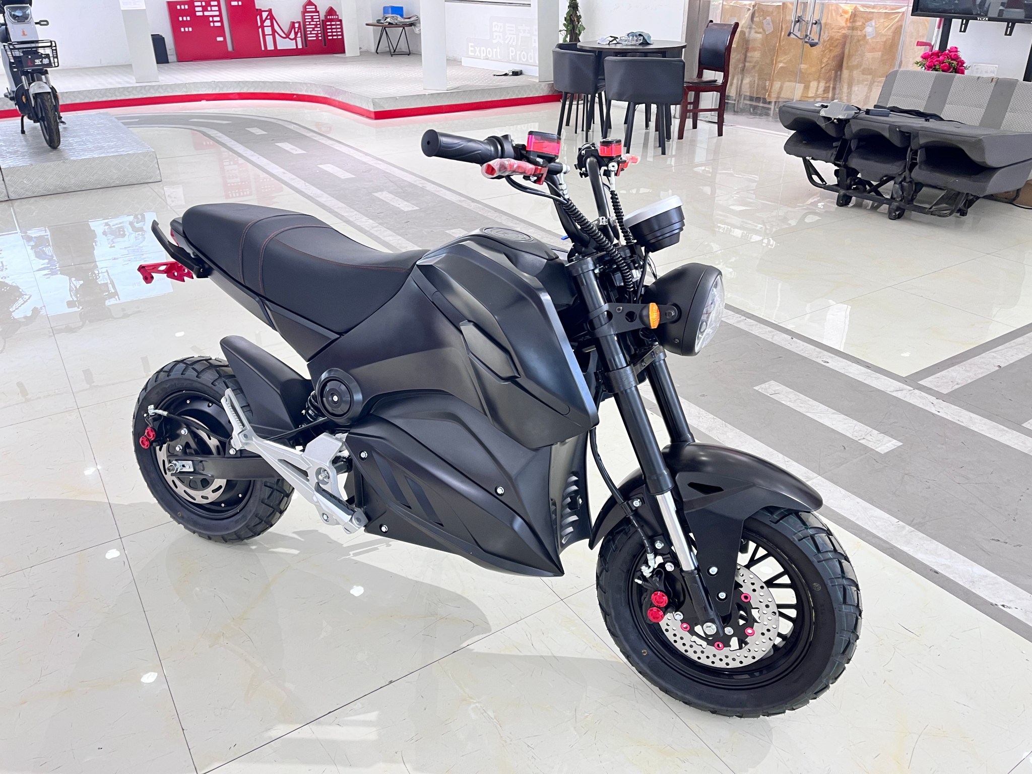 World's First Electric Motorcycle with Built In Solar Panels
